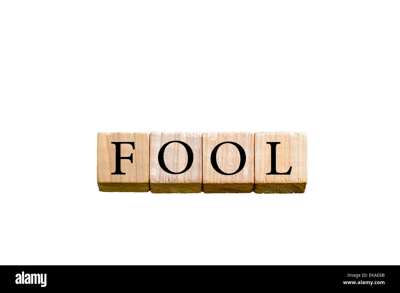 Word FOOL. Wooden small cubes with letters isolated on white background ...