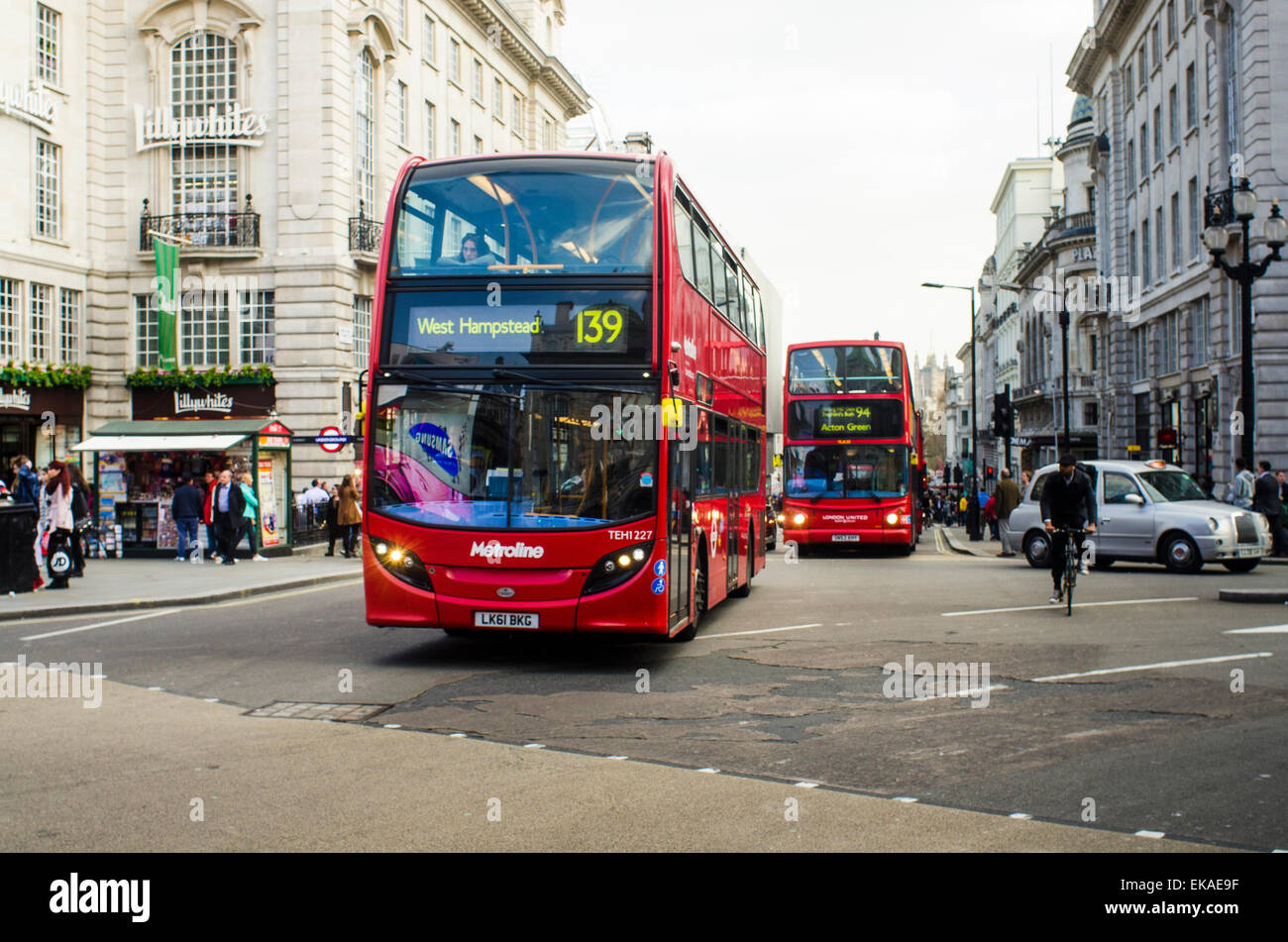 A busy junction, buses, commuters, taxis, at London's Piccadilly at the ...