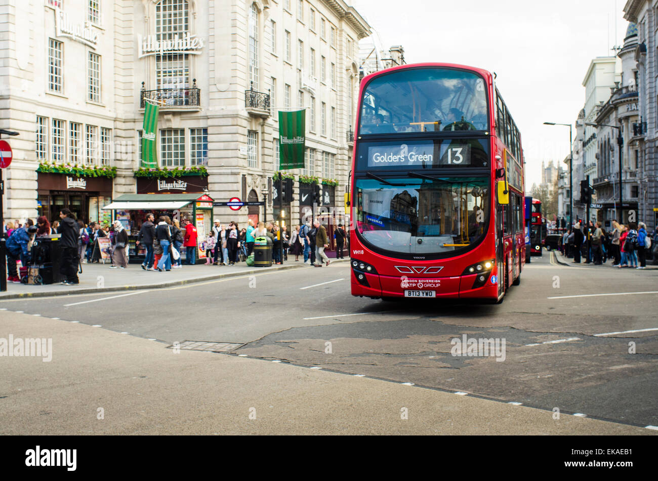 A busy junction, buses, commuters, taxis, at London's Piccadilly at the ...