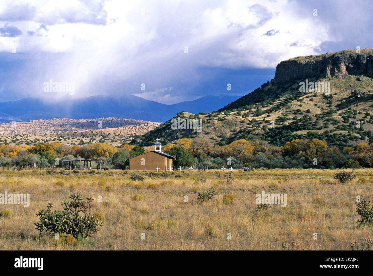 A early October storm creates a dramatic scene with a little church and ...