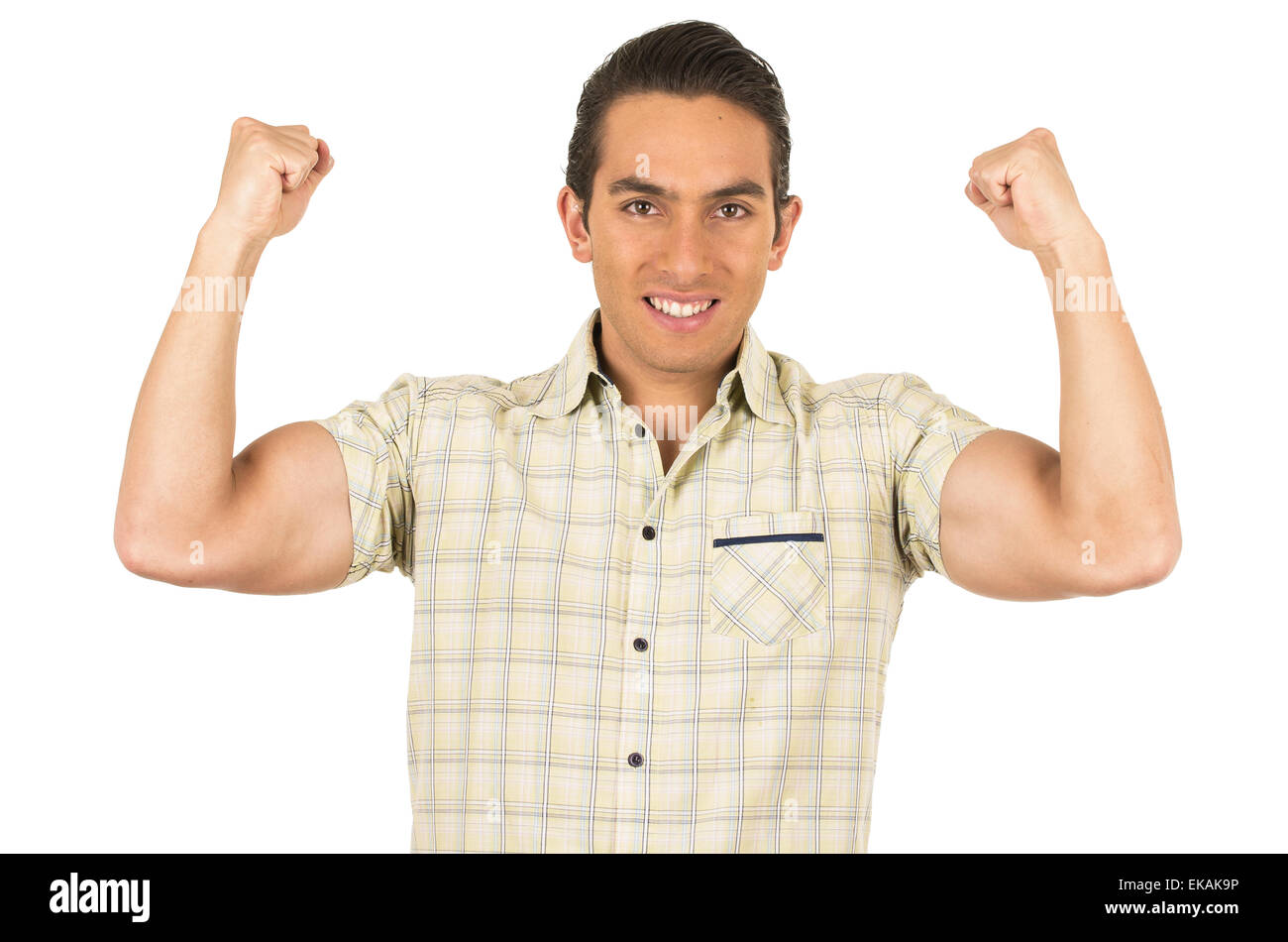 young handsome hispanic man posing showing arm muscles Stock Photo - Alamy