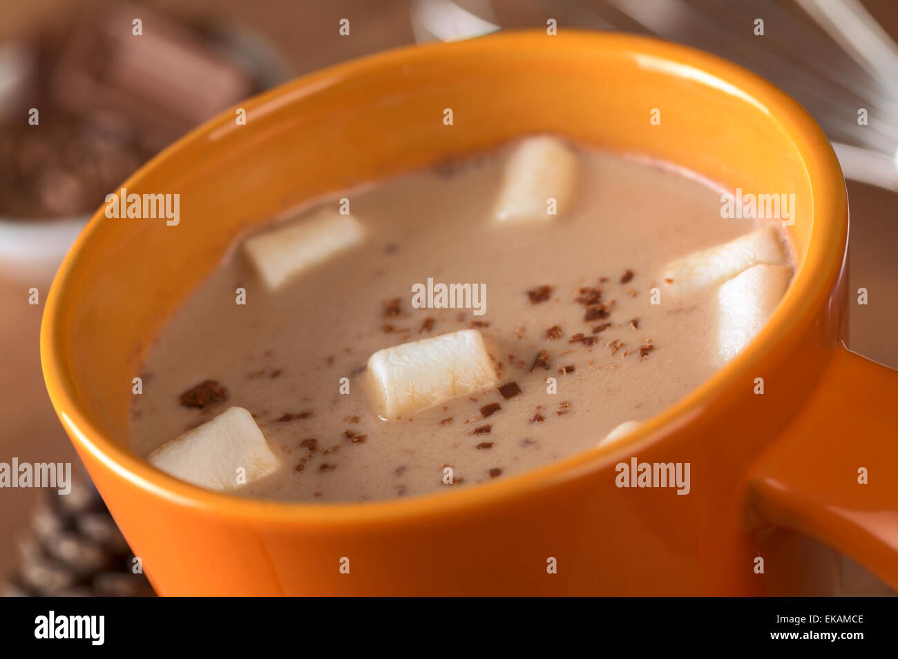 Hot chocolate with marshmallows in orange cup (Selective Focus, Focus ...