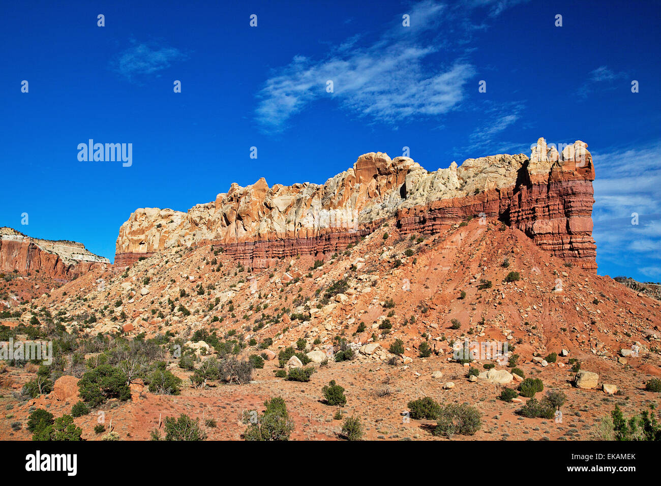 The sight of the dramatic red sandstone formations along the highway is ...