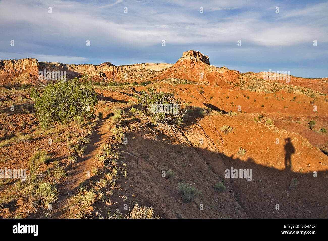 The red cliffs of Kitchen Mesa around the resort of Ghost Ranch near ...