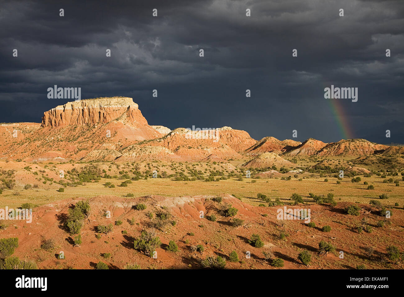 The red sandstone cliffs of Kitchen Mesa at Ghost Ranch can become ...