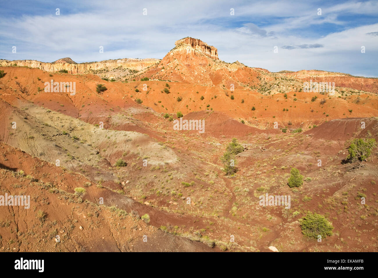 The red cliffs of Kitchen Mesa around the resort of Ghost Ranch near ...