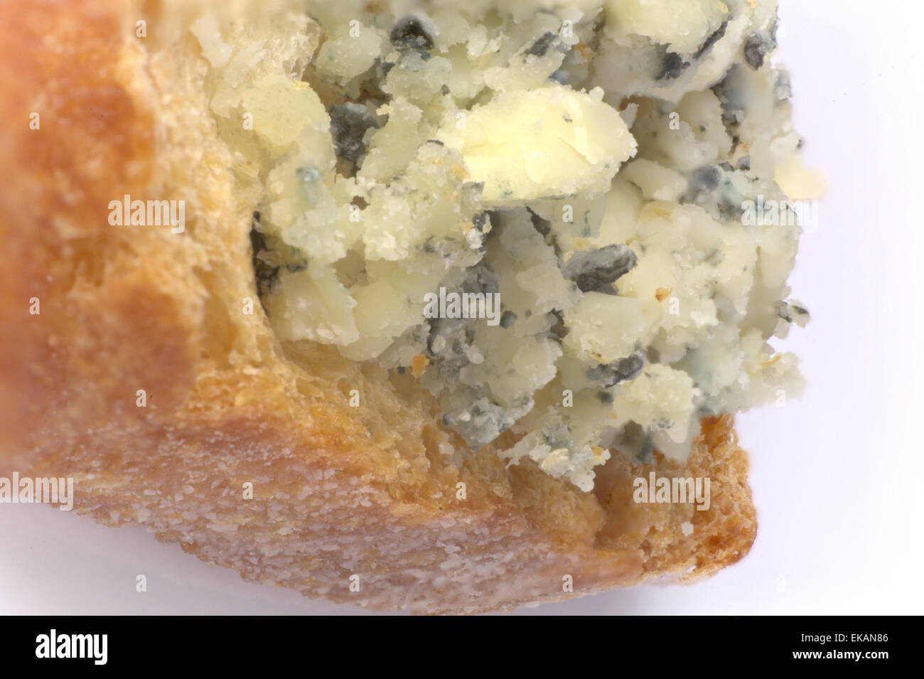 Blue cheese on toast closeup with white background Stock Photo - Alamy