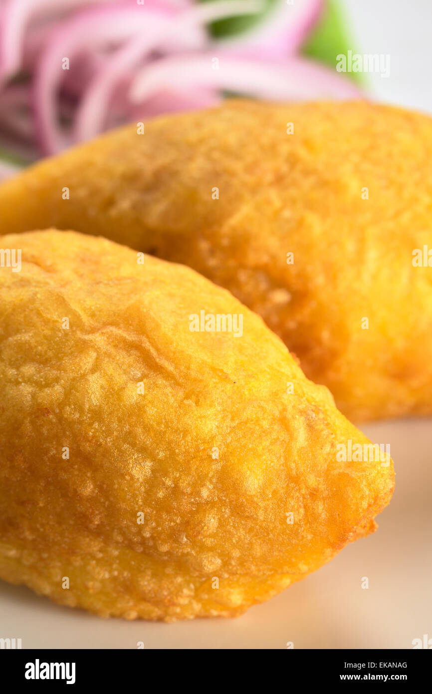 Peruvian dish called Papa Rellena (Stuffed Potato) made of mashed ...