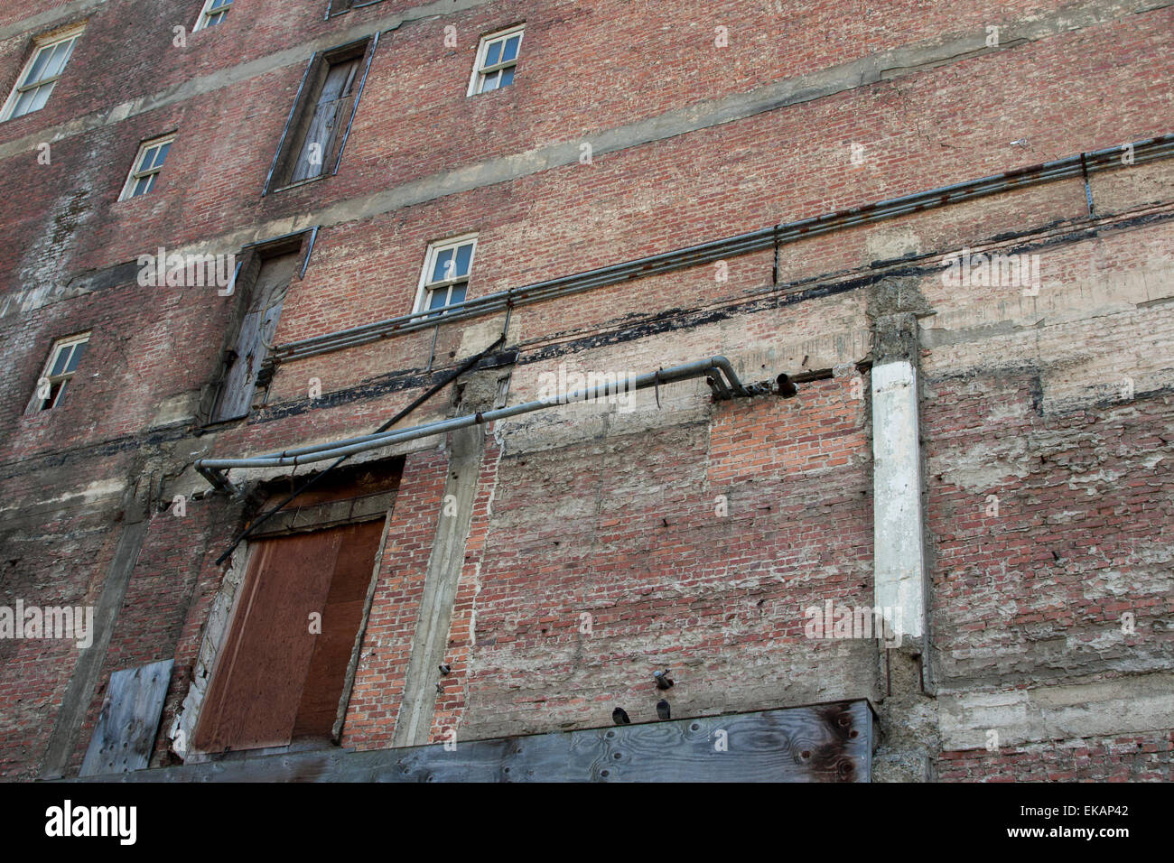 The side of an old brick building on Broadway in downtown Oakland ...