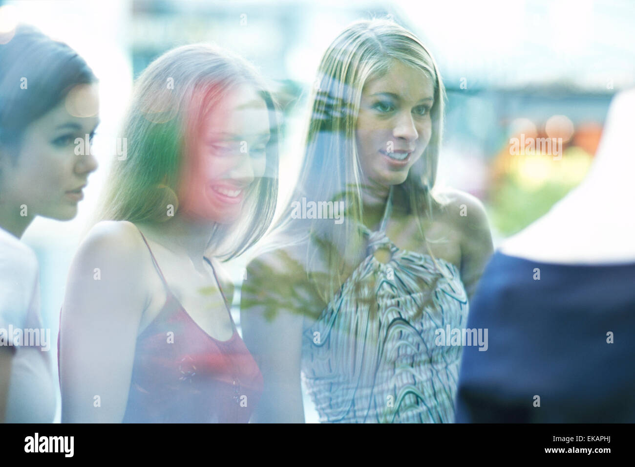 Teen girls window shopping at outdoors mall Stock Photo - Alamy