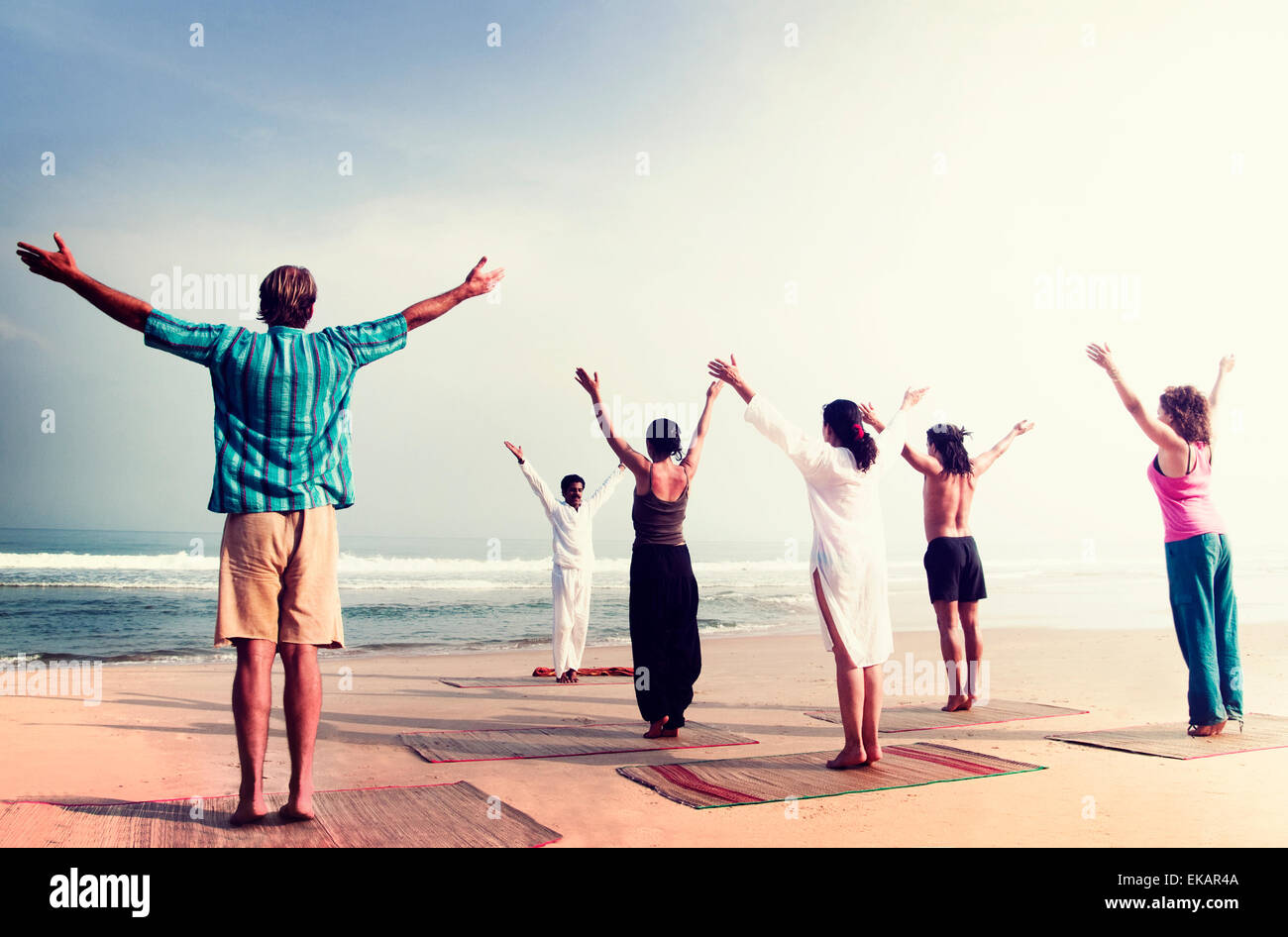 Yoga Wellbeing Exercise Beach Concept Stock Photo - Alamy
