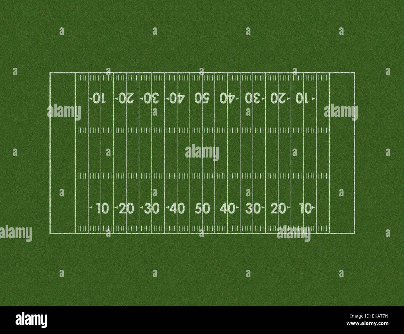 A football pitch marked in white on green grass Stock Photo - Alamy