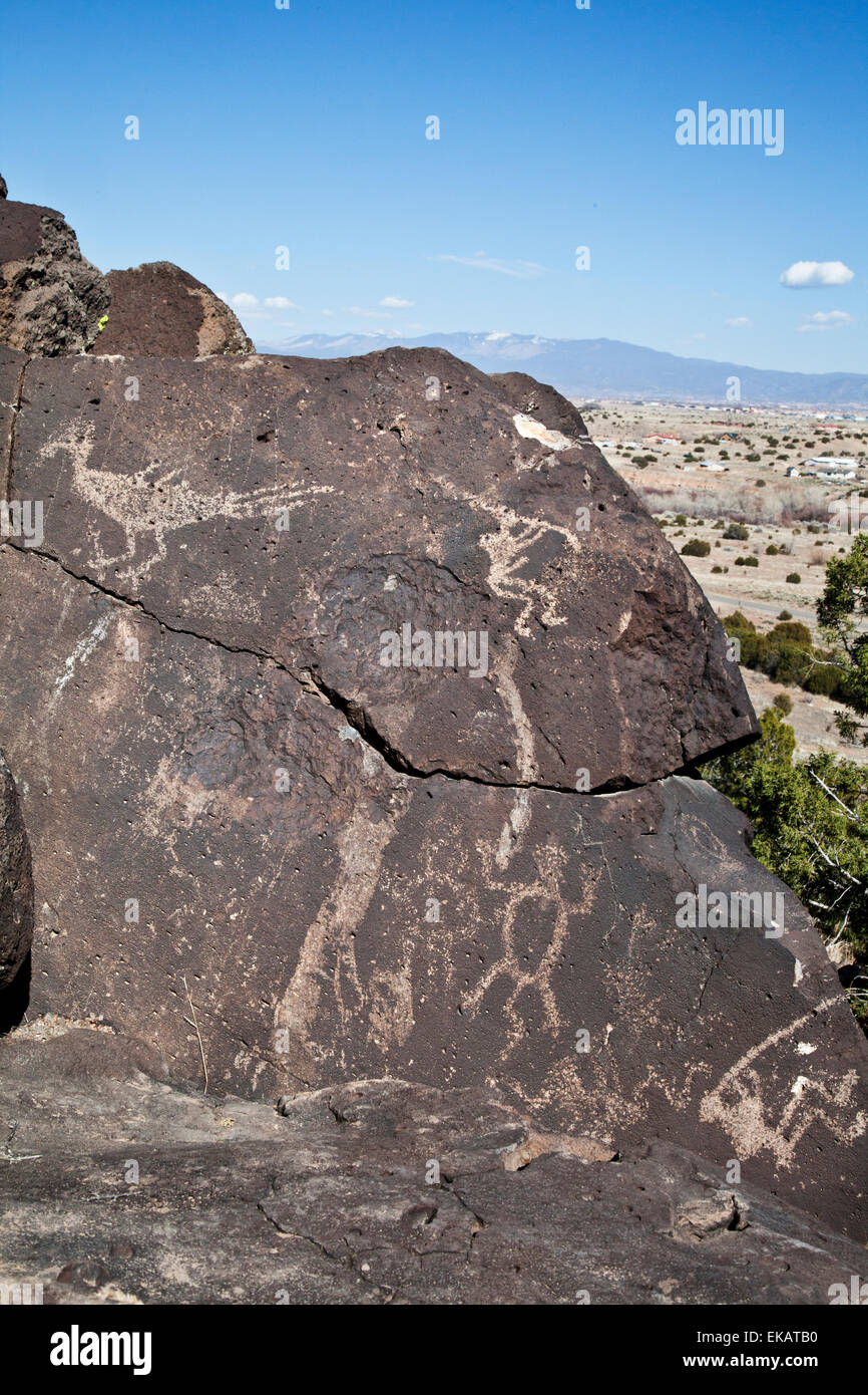 Hundreds of ancient petroglyphs can be seen near the Santa Fe River in ...