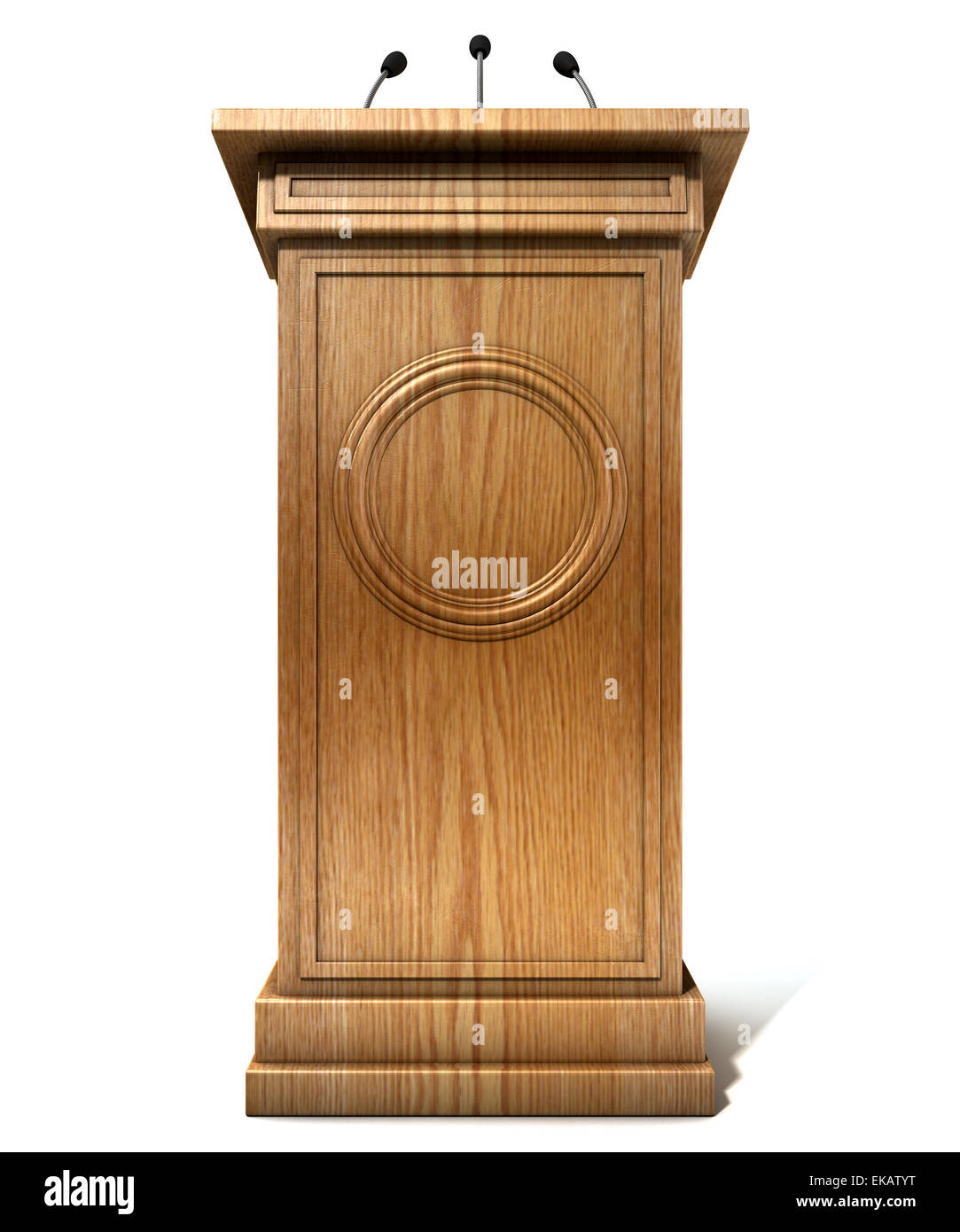 A wooden speech podium with three small microphones attached on an ...