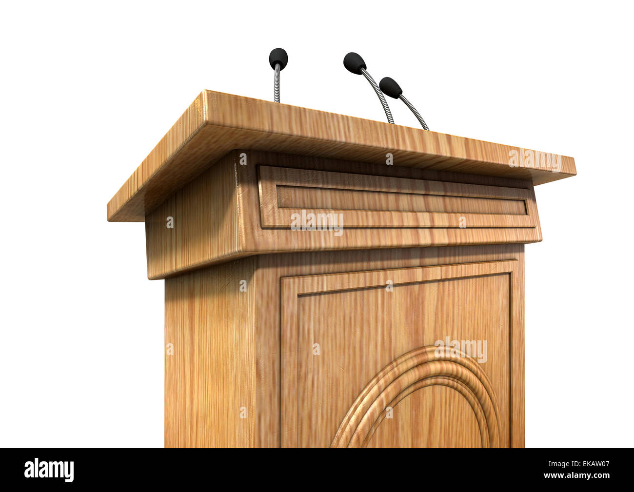 A wooden speech podium with three small microphones attached on an ...