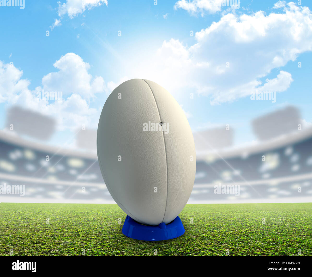 A rugby stadium with a generic white rugby ball on a blue kicking tee ...