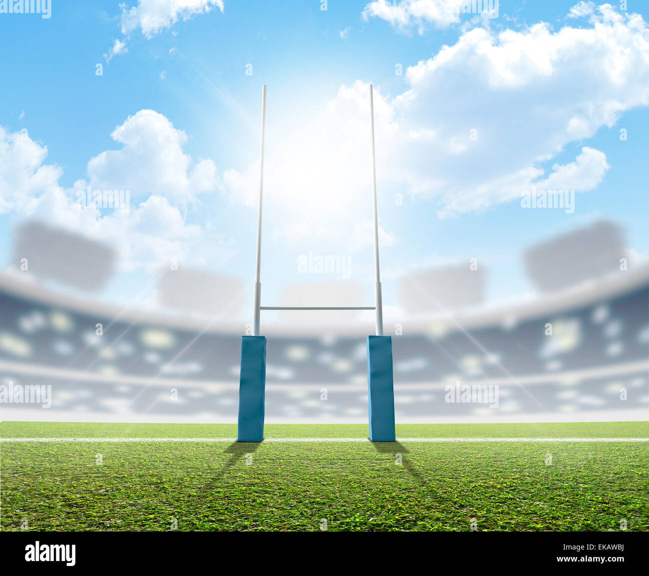 A rugby stadium with rugby posts on a marked green grass pitch in the ...