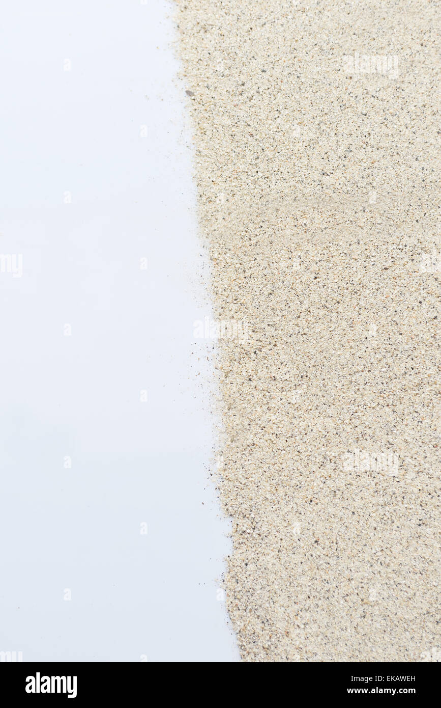Brush the sand is white background behind Stock Photo - Alamy