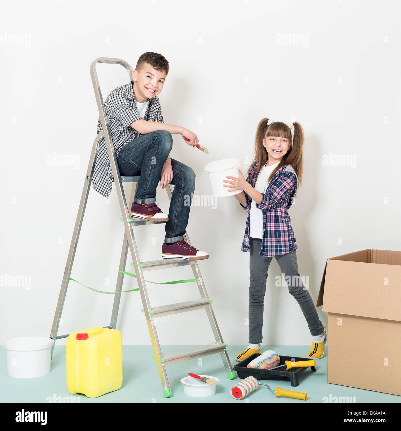 Female helping home work children hi-res stock photography and images ...
