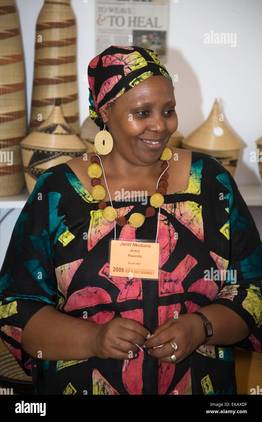 Janet Nkubana from Rwanda displays her colorful basketry at the Santa ...
