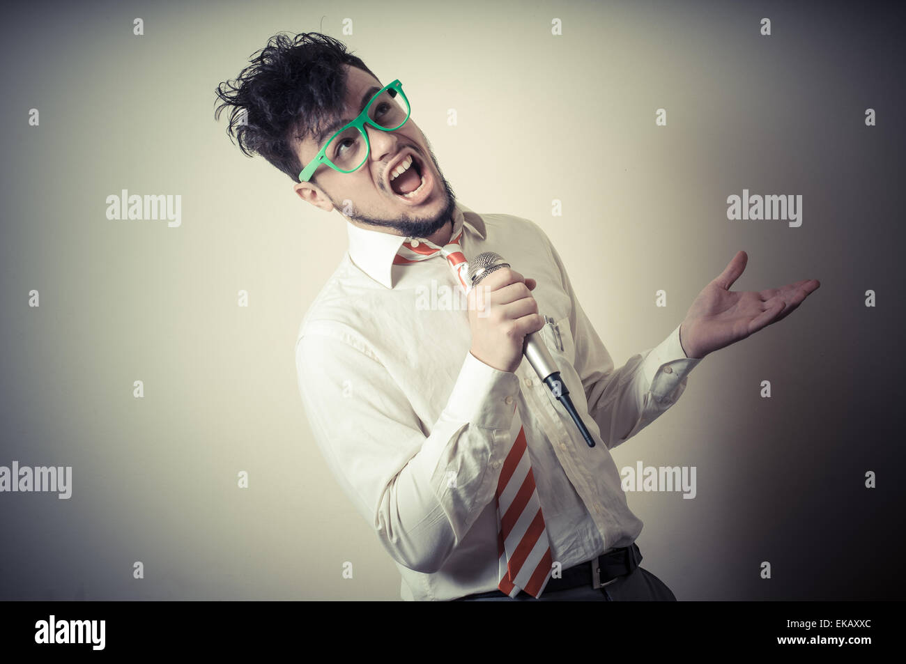 funny stylish businessman singing Stock Photo - Alamy