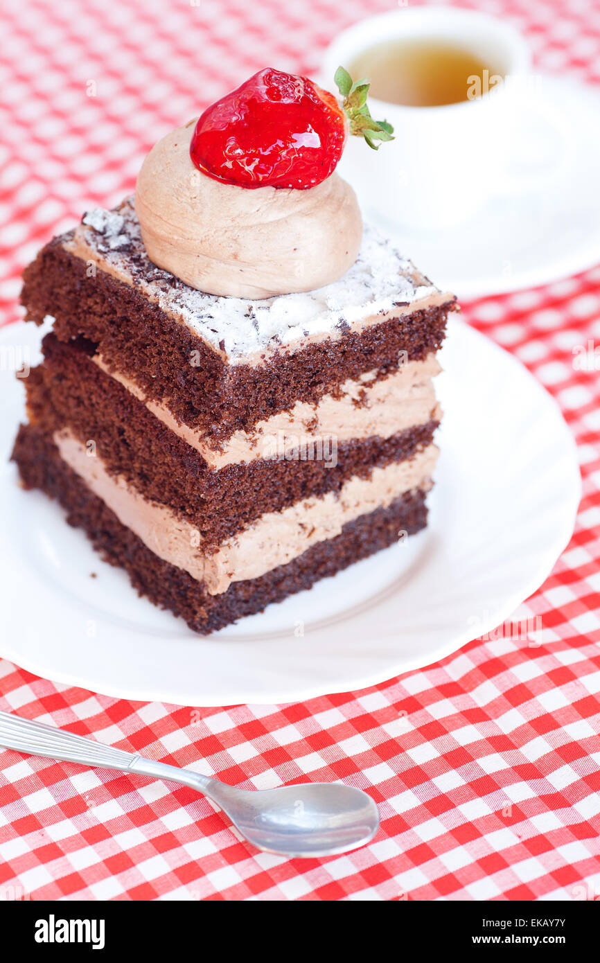beautiful cake with strawberry and tea on plaid fabric Stock Photo - Alamy