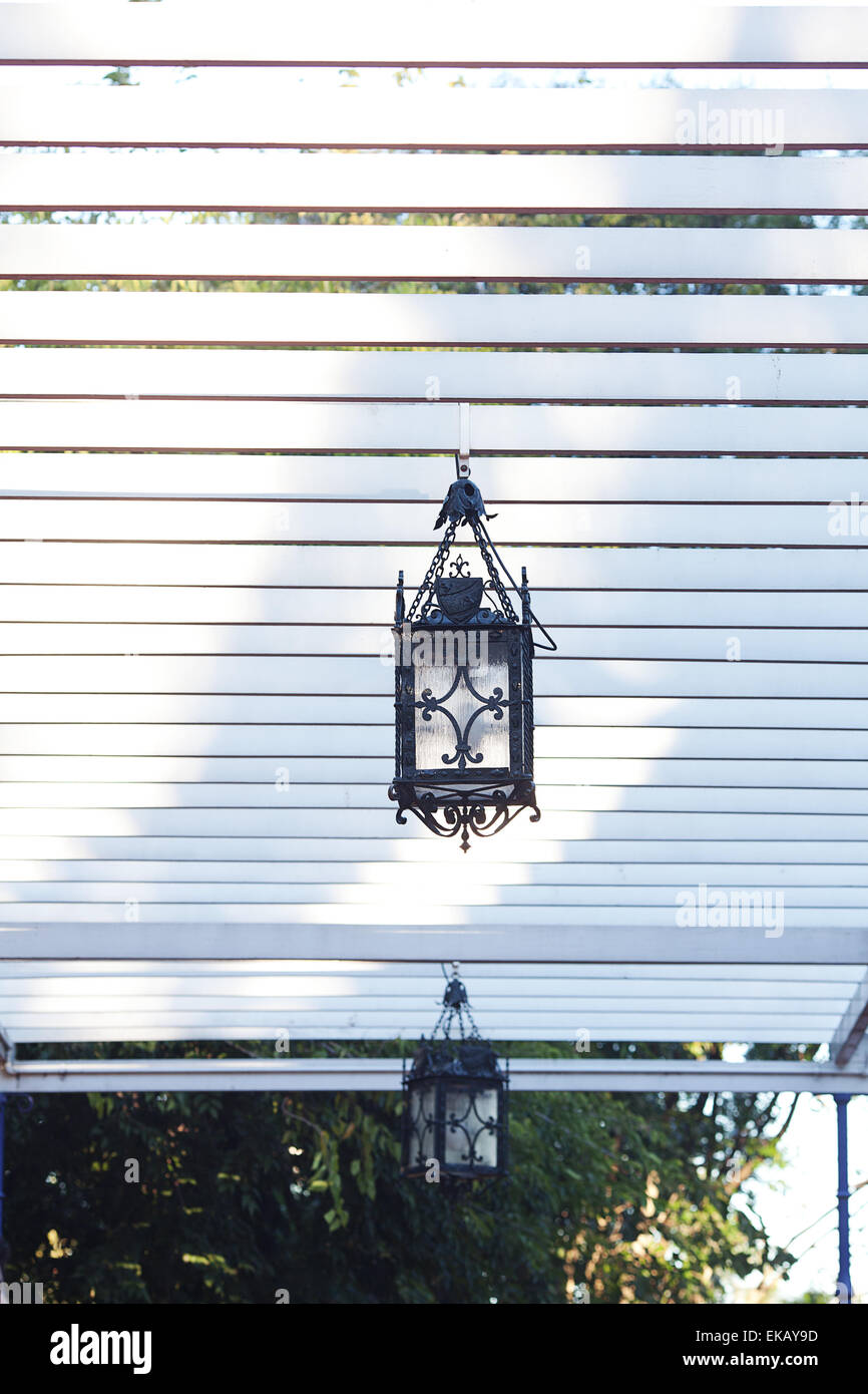 decorative lantern hanging in the arbor Stock Photo - Alamy