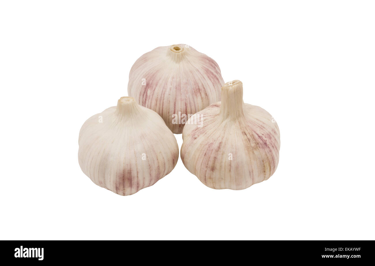 Three cloves of garlic. Isolated on white background Stock Photo - Alamy