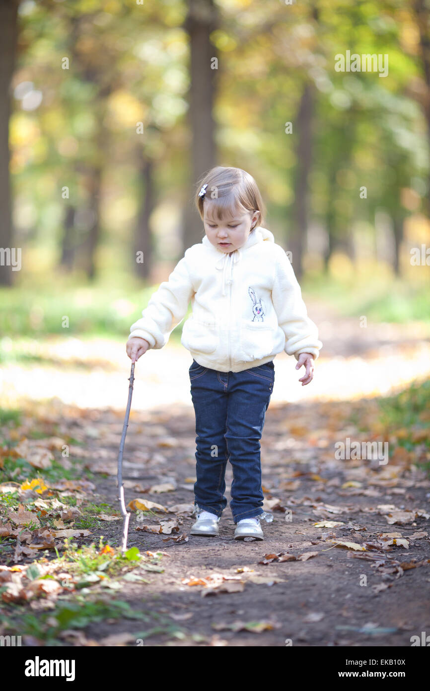 Girl with a stick hi-res stock photography and images - Alamy