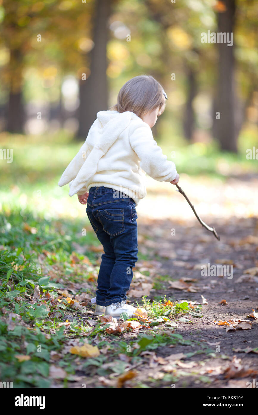Girl with a stick hi-res stock photography and images - Alamy