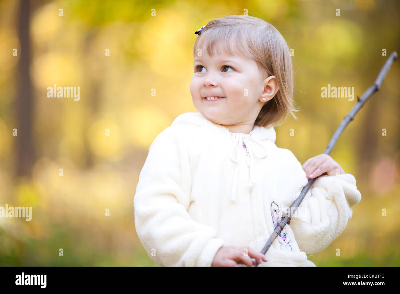 Girl with a stick hi-res stock photography and images - Alamy