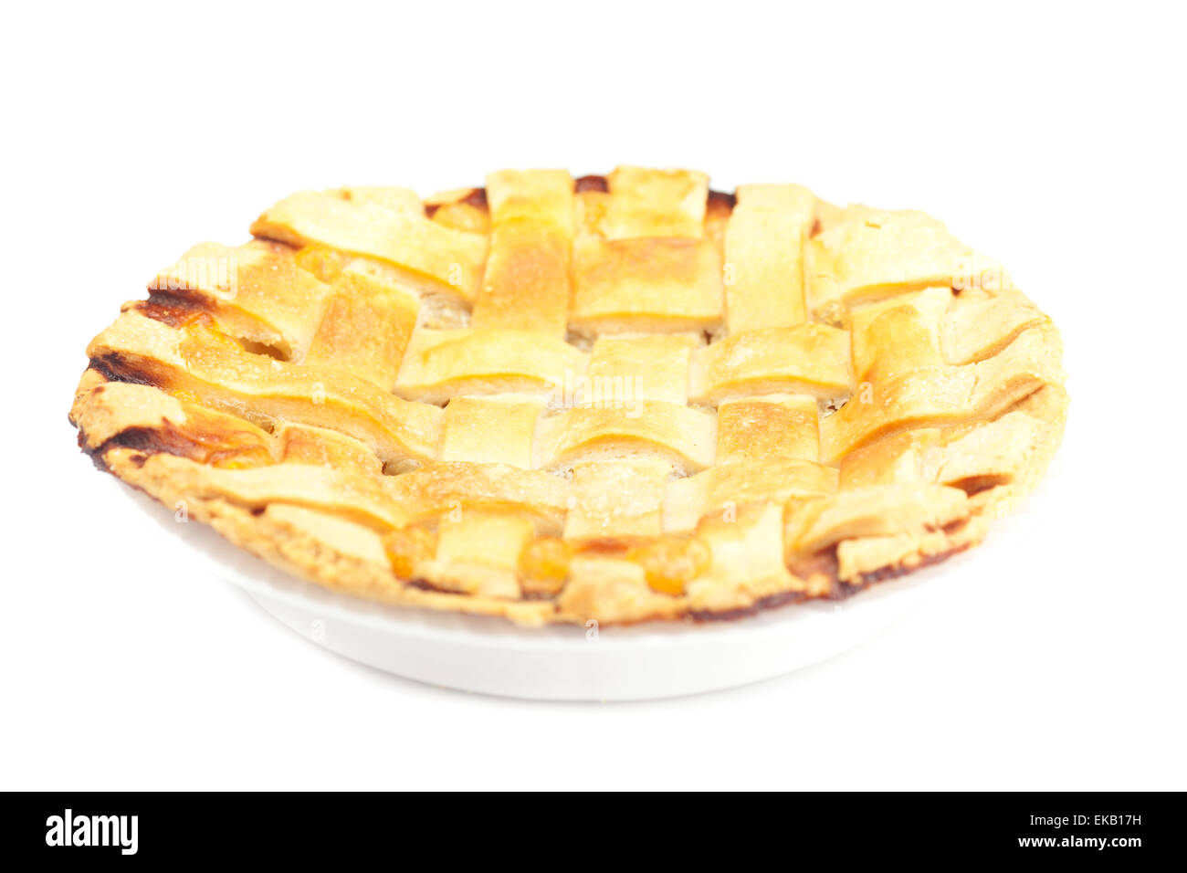 apple pie on a plate isolated on white Stock Photo - Alamy
