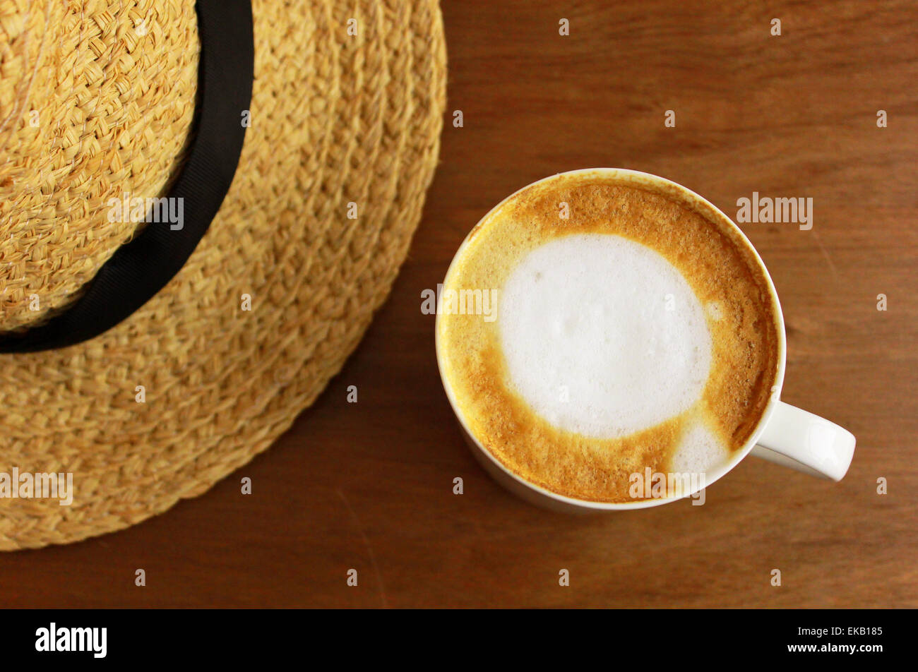 Cappuccino or latte coffee with straw hat Stock Photo - Alamy