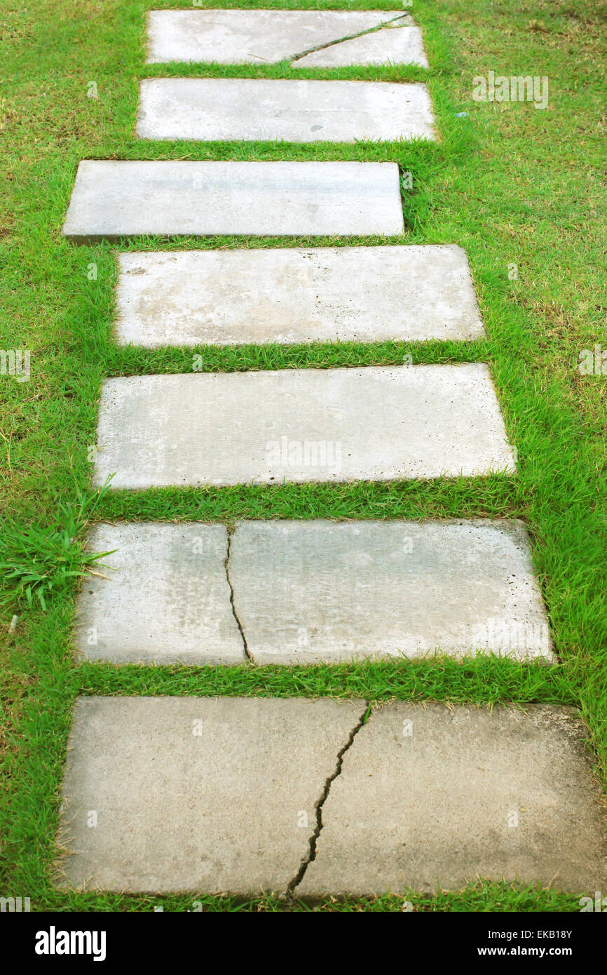Damaged stone walkway in the garden Stock Photo - Alamy