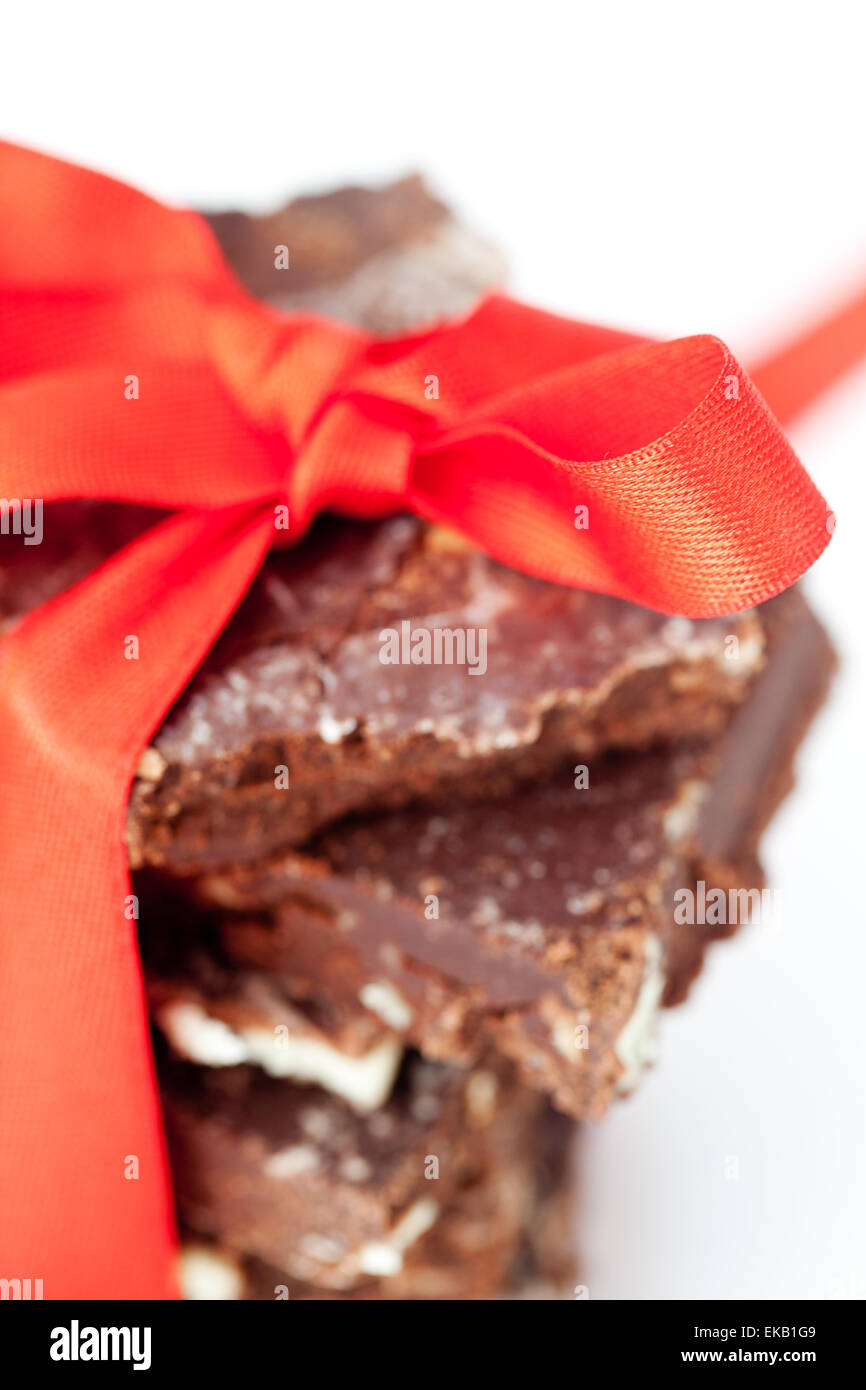 background of stack of chocolate with red ribbon Stock Photo - Alamy