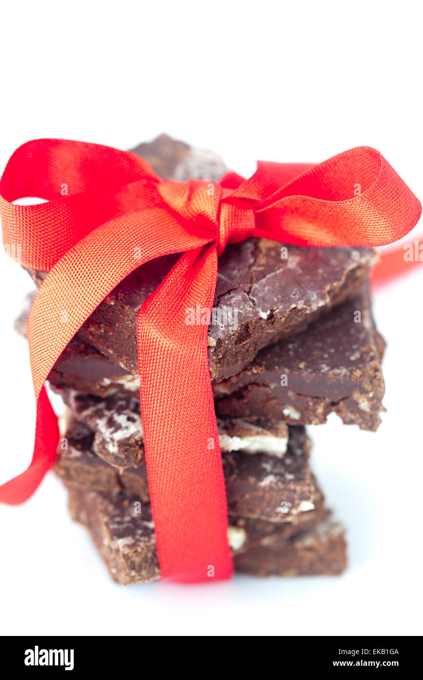 background of stack of chocolate with red ribbon Stock Photo - Alamy
