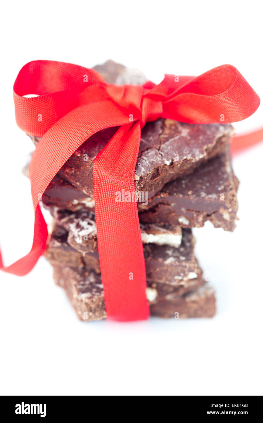 background of stack of chocolate with red ribbon Stock Photo - Alamy