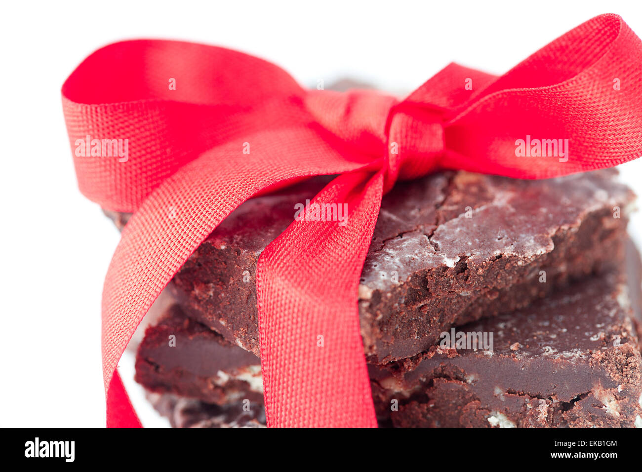 background of stack of chocolate with red ribbon Stock Photo - Alamy
