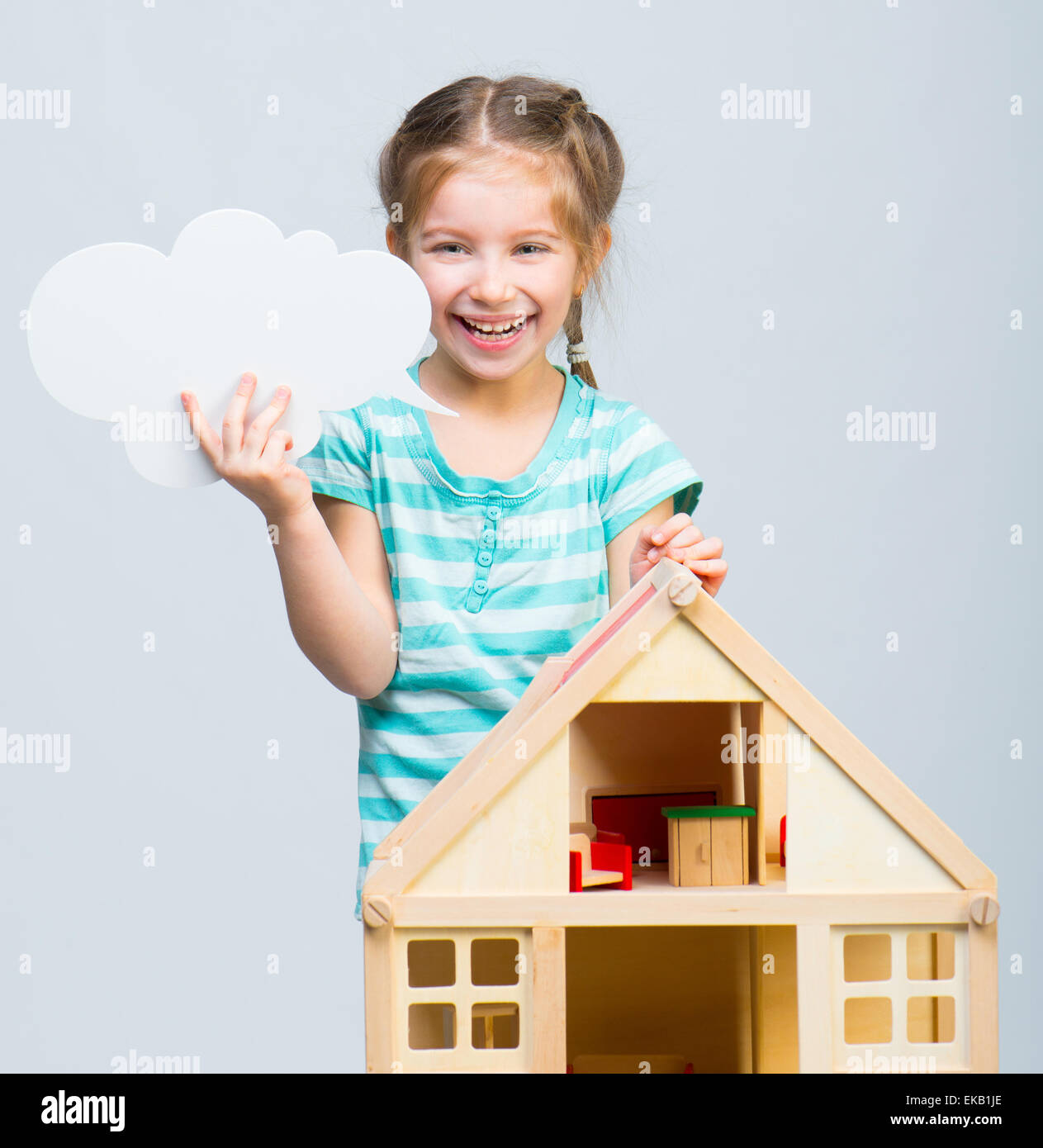 girl with a toy house Stock Photo - Alamy