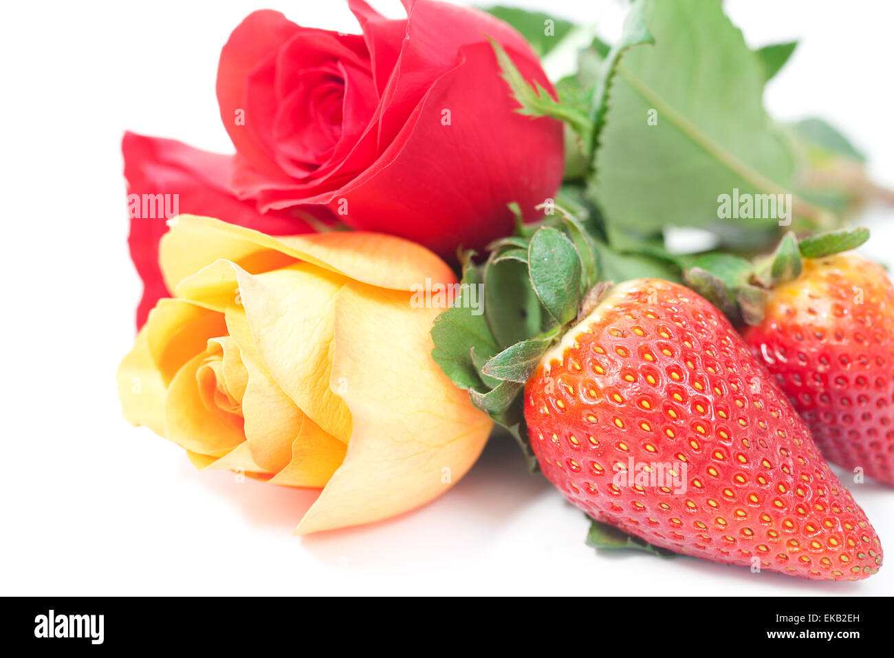 bouquet of colorful roses and strawberry isolated on white Stock Photo ...