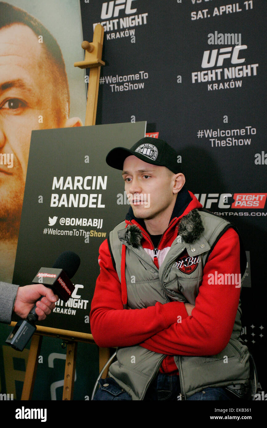 Krakow, Poland. 08th Apr, 2015. Marcin Bandel answers questions during ...