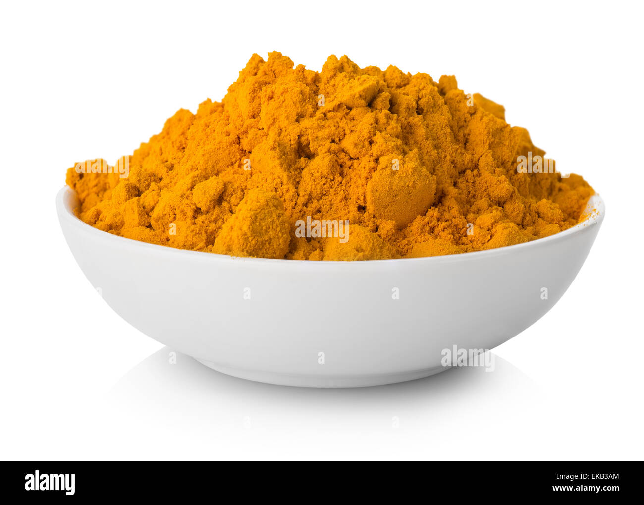 Turmeric powder in plate Cut Out Stock Images & Pictures - Alamy