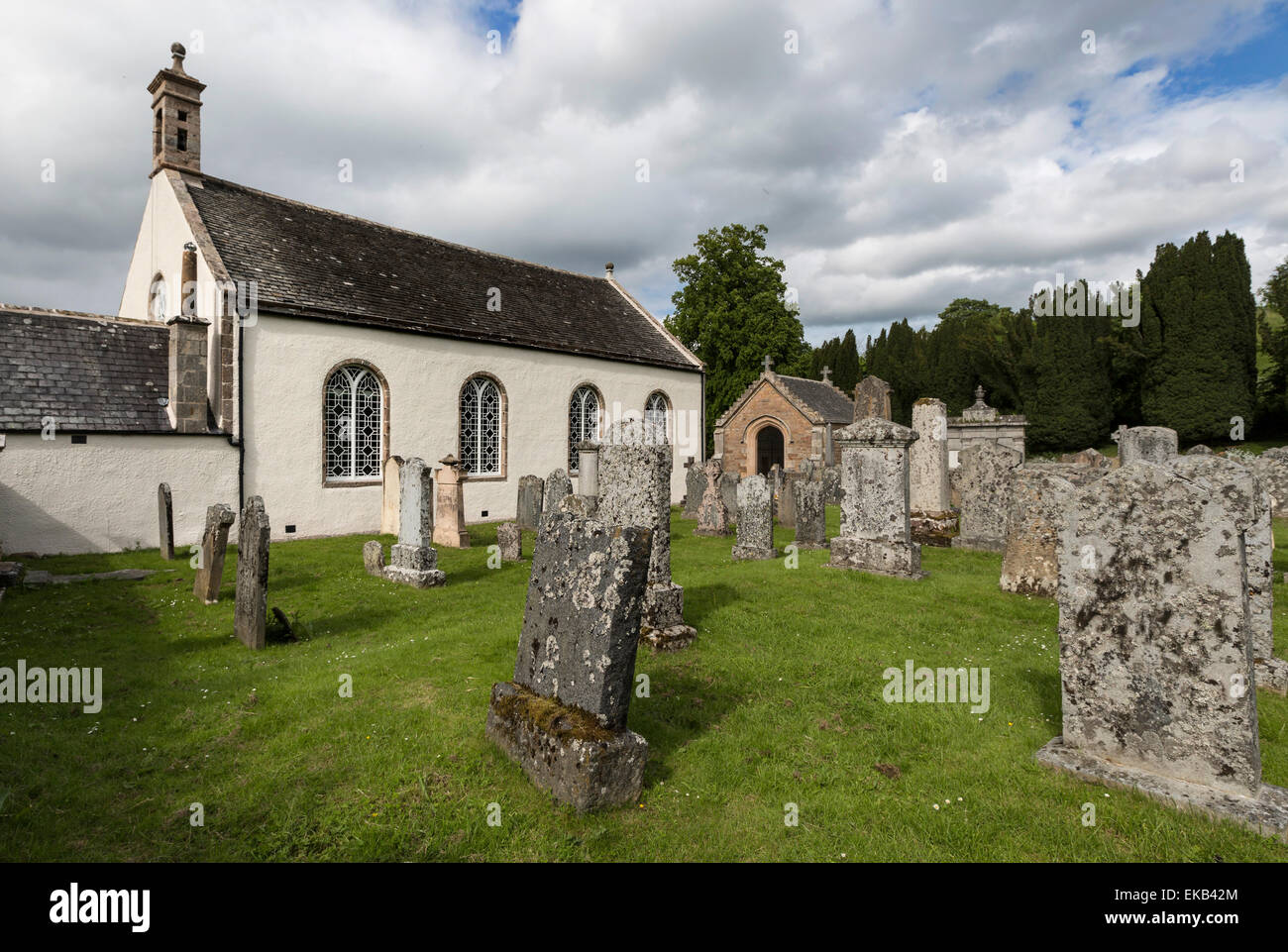 Scottish cemetery with tombstones and church, Scotland, UK Stock Photo ...