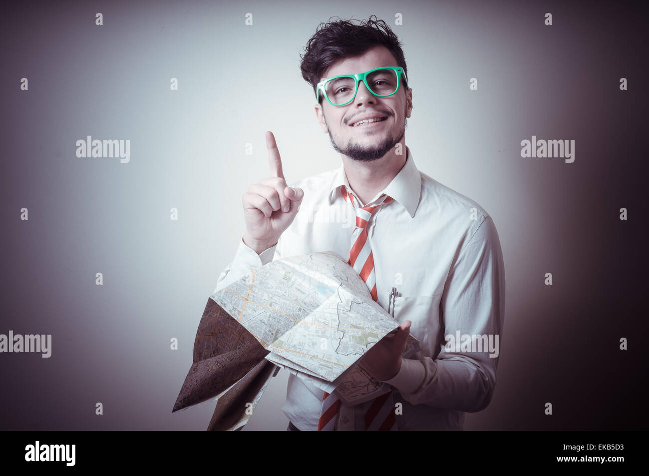 lost businessman with map Stock Photo - Alamy