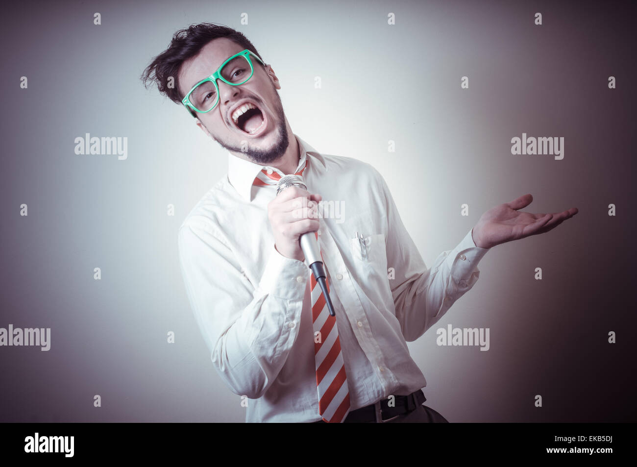 funny stylish businessman singing Stock Photo - Alamy