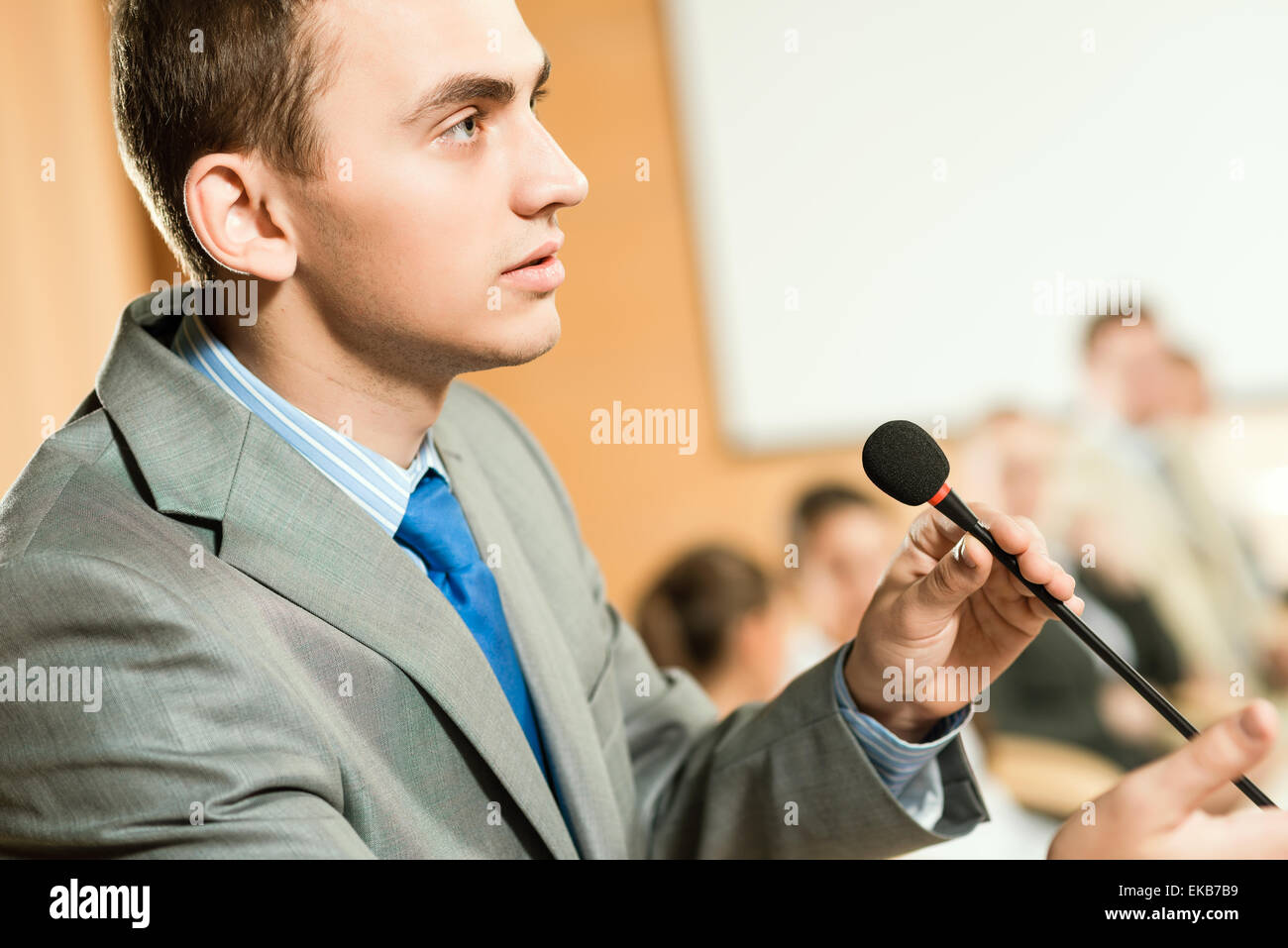Young male speaker podium hi-res stock photography and images - Alamy