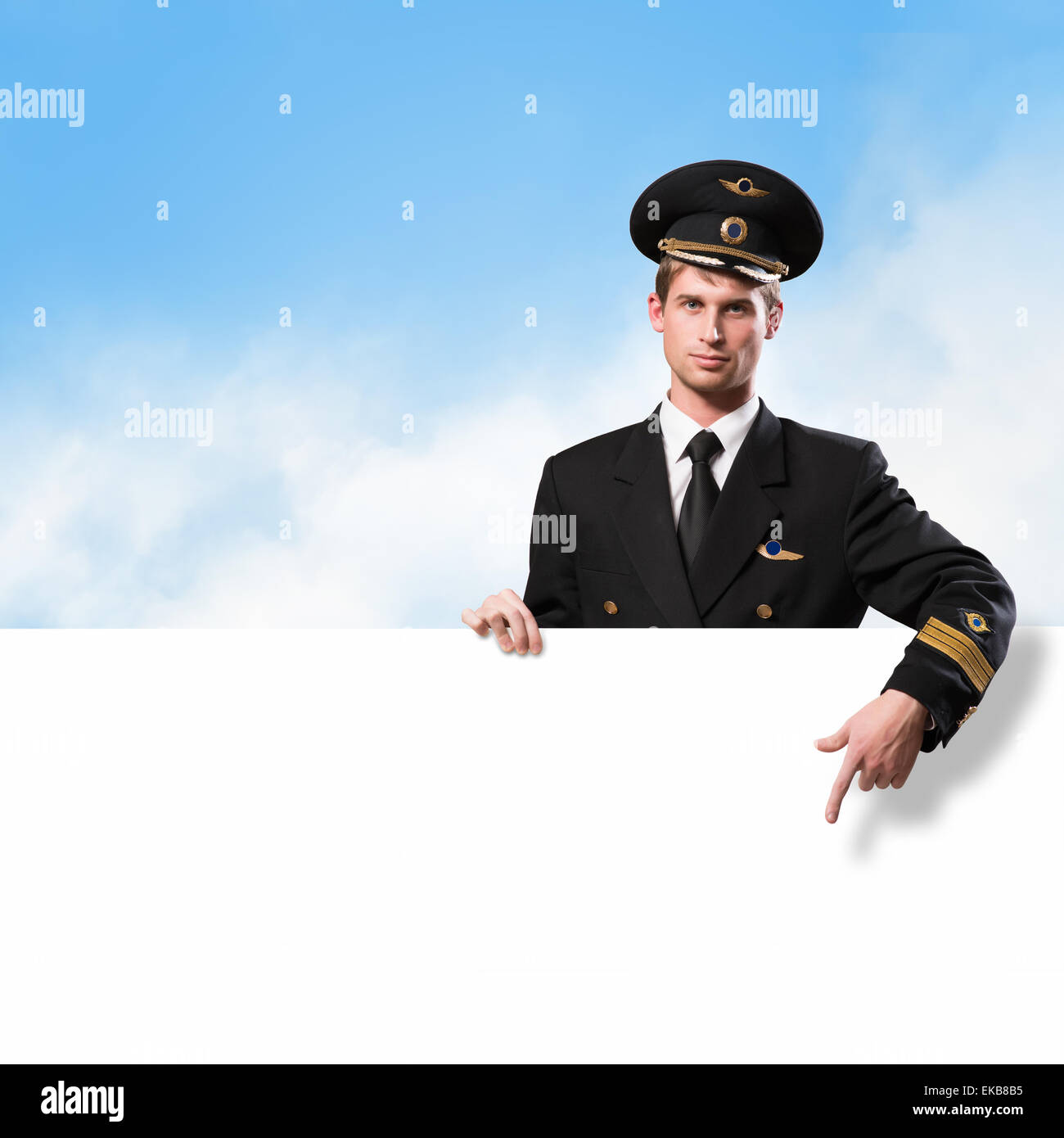 pilot in the form of holding an empty billboard Stock Photo - Alamy