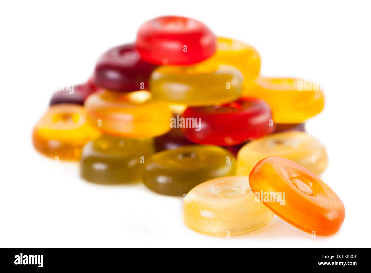 Bright candies isolated on a white background Stock Photo - Alamy