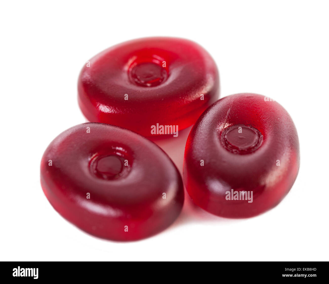 Red candies isolated on a white background Stock Photo - Alamy