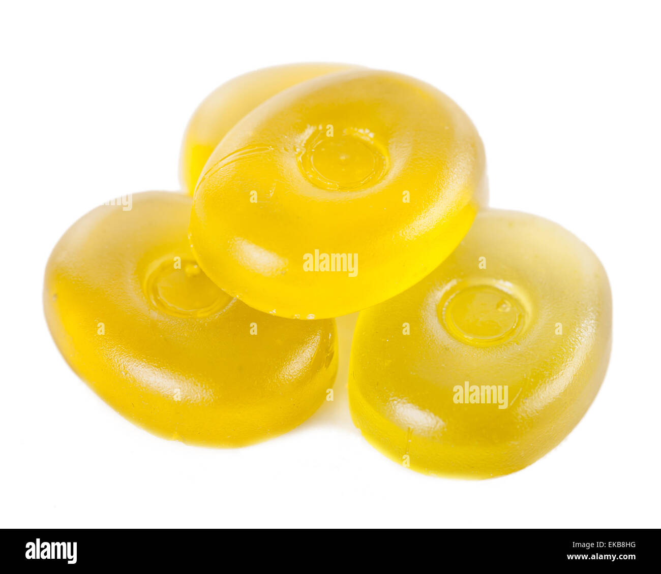 Yellow candies isolated on a white background Stock Photo - Alamy